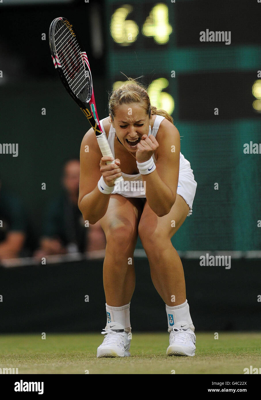 Germany's Sabine Lisicki celebrates defeating China's Na Li during day ...