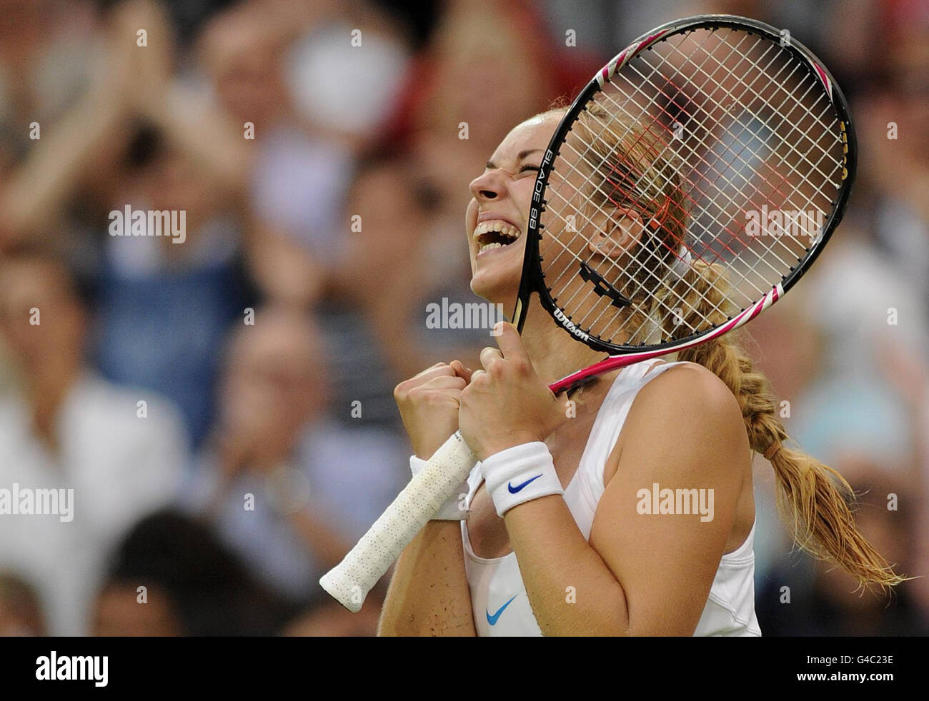 Germany's Sabine Lisicki celebrates defeating China's Na Li during day ...