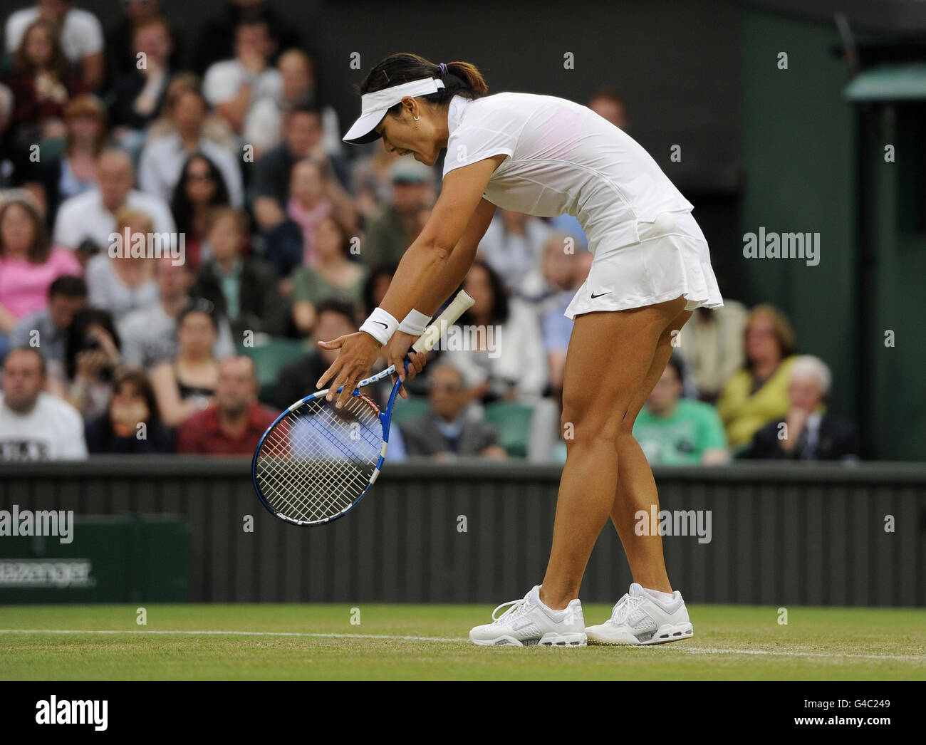 China's Na Li reacts in her match against Germany's Sabine Lisicki ...