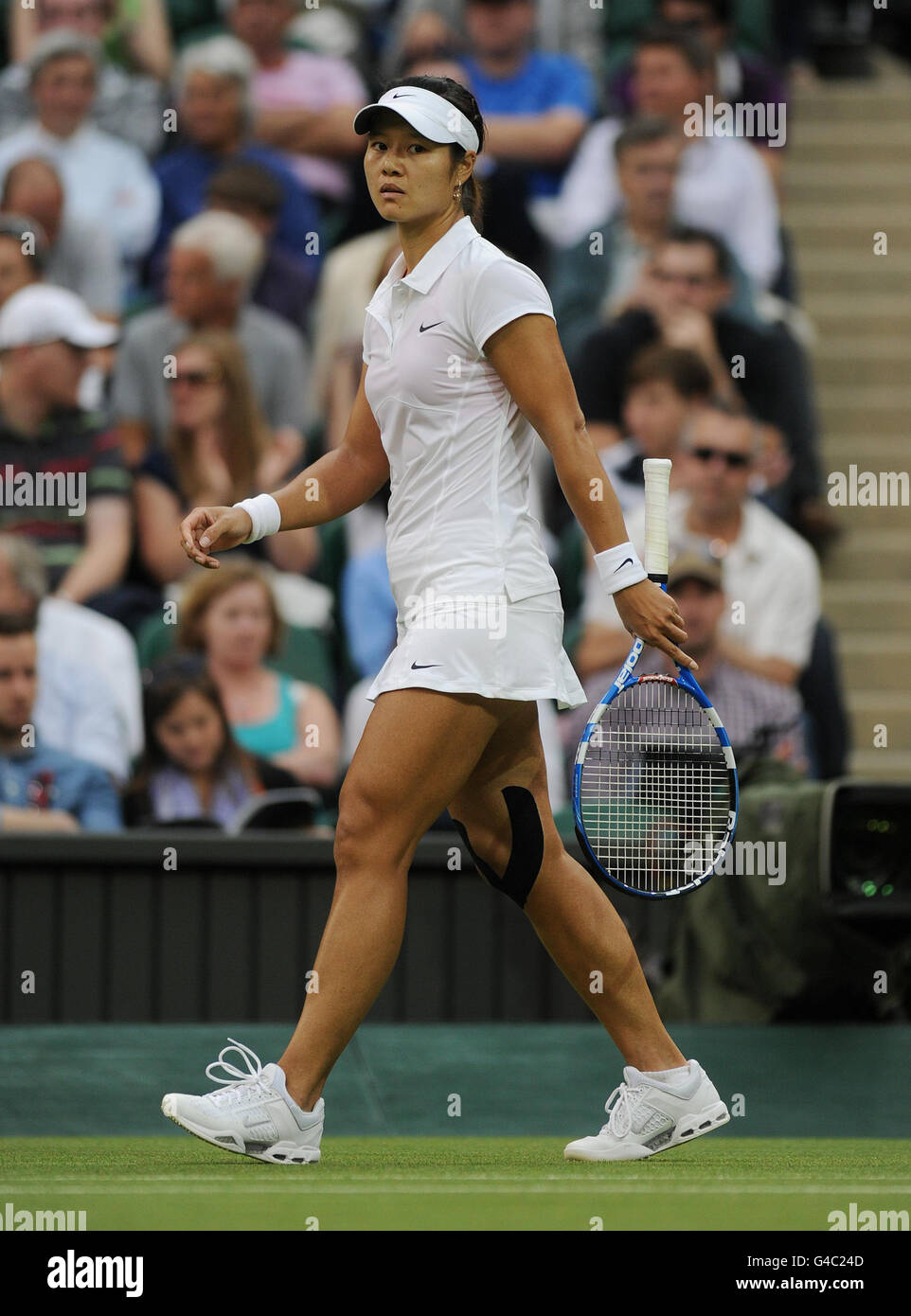 China's Na Li reacts in her match against Germany's Sabine Lisicki ...