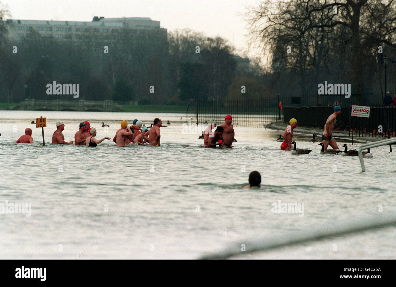 PA NEWS PHOTO 25/12/94 SWIMMERS TAKING PART IN THE PETER PAN SWIMMING ...