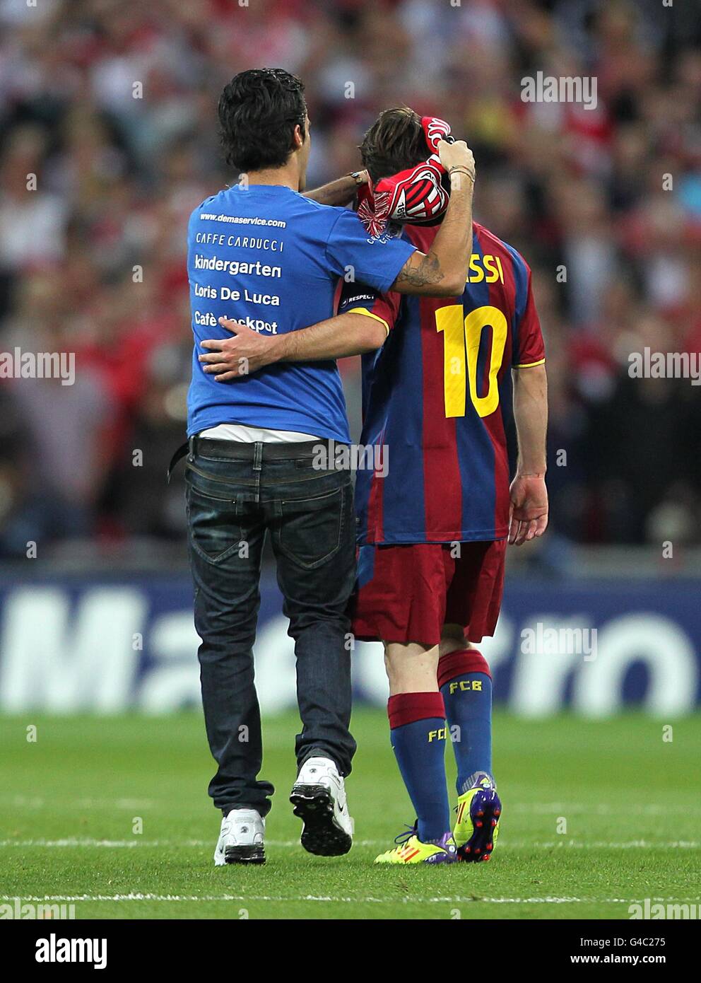 A pitch invader with lionel messi right on the pitch hi-res stock ...