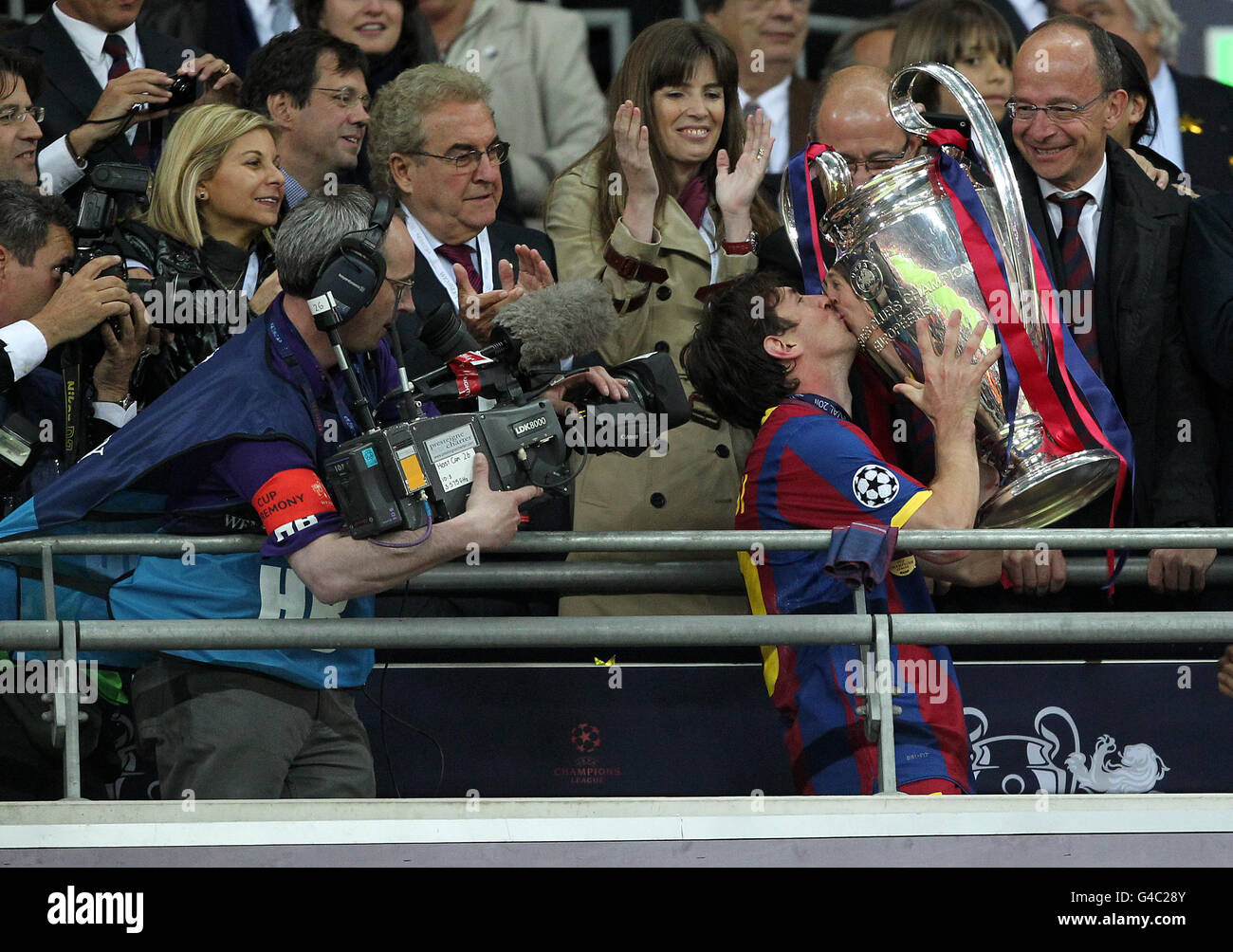 Barcelonas lionel messi celebrates winning the uefa champions league hi ...