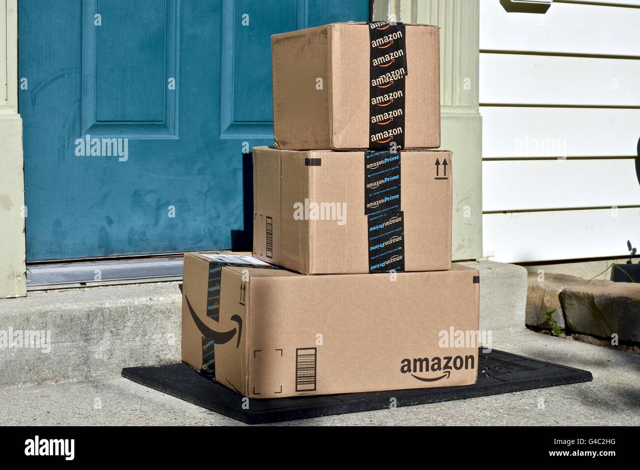 Amazon Prime boxes delivered to the front door of a home Stock Photo ...