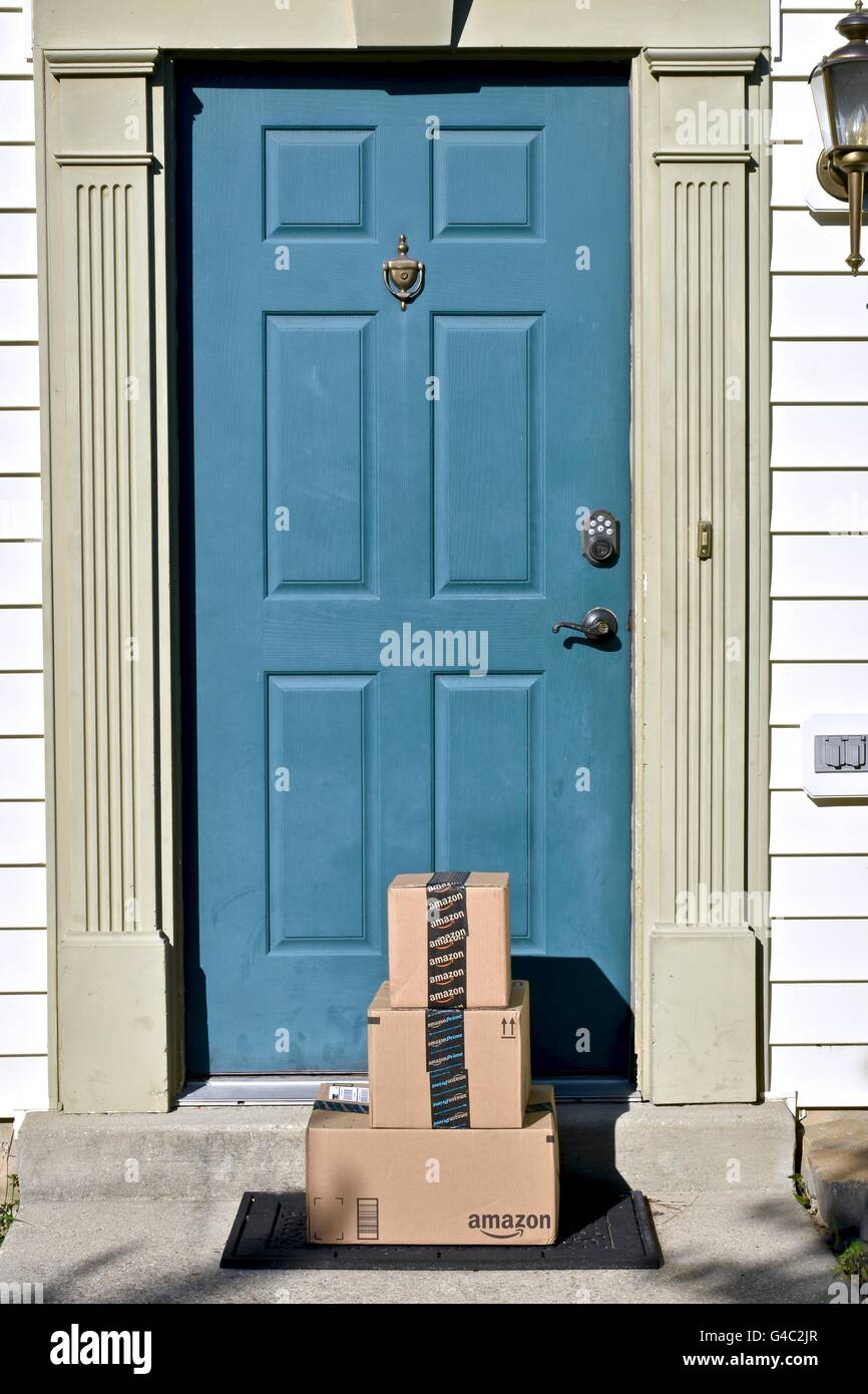 Amazon Prime boxes delivered to the front door of a home Stock Photo ...