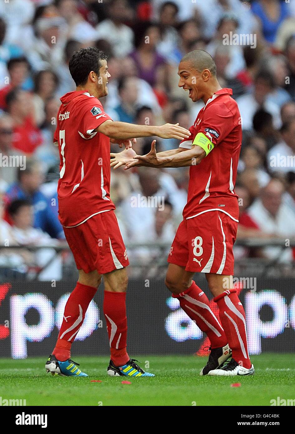 Switzerland's Tranquillo Barnetta (left) celebrates scoring their first ...