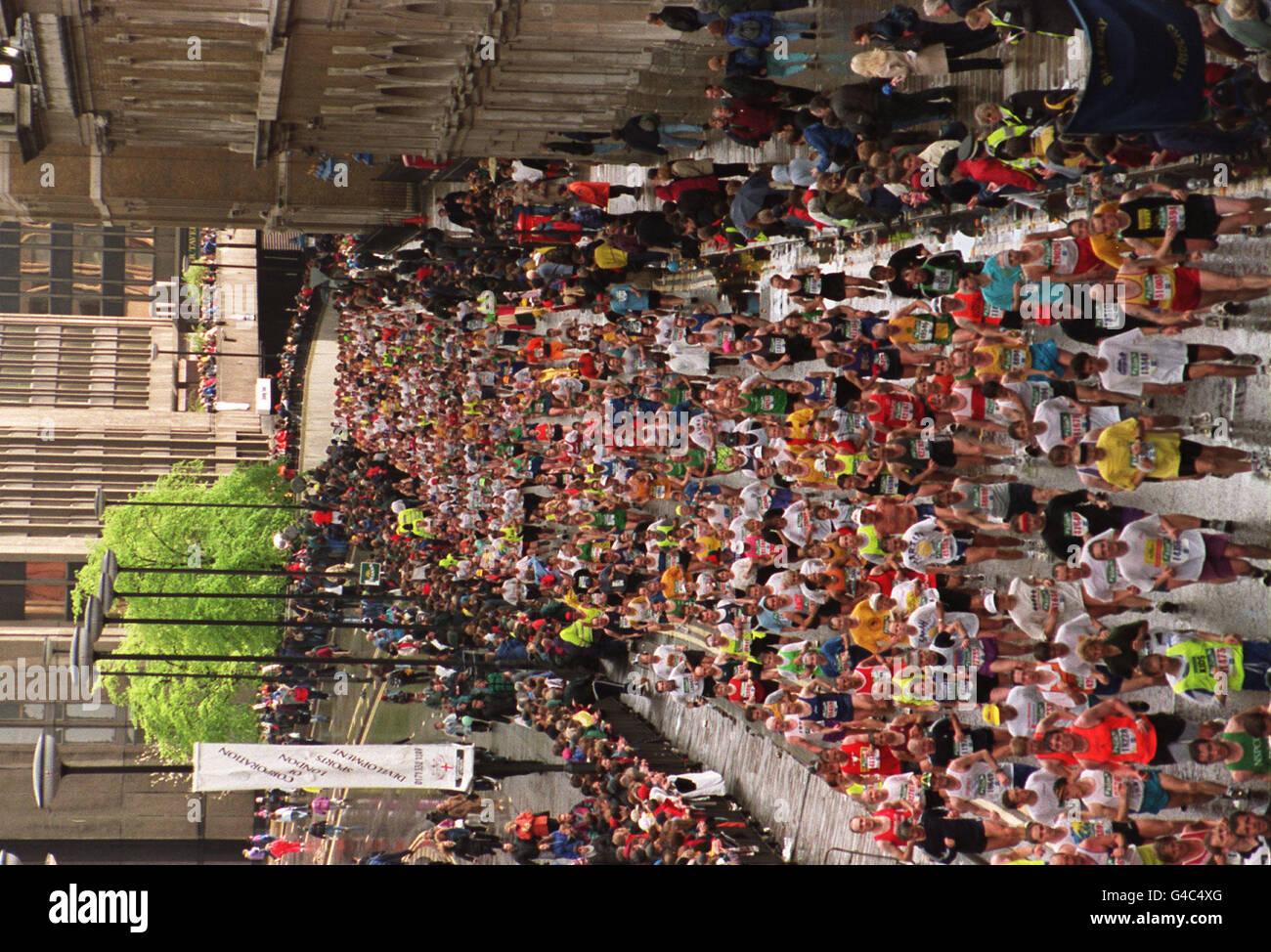 Runners make their way down Byward Street, in the City, during the 1998 ...