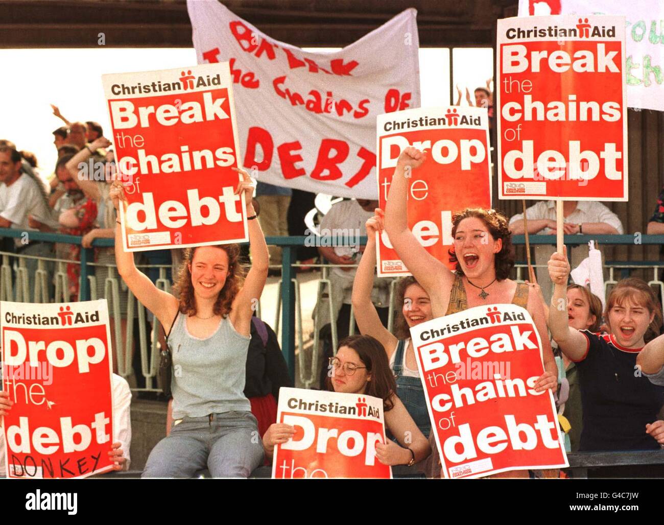Protesters form a human chain surrounding the site of the G8 Summit in ...