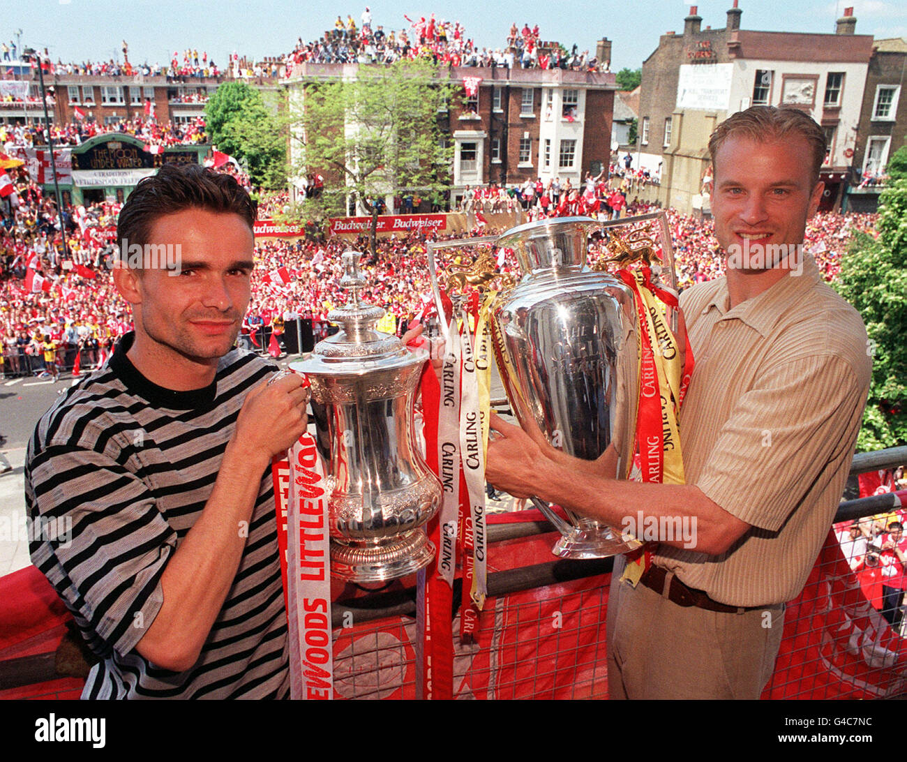 Arsenal bus Overmars/Bergkamp cups Stock Photo - Alamy