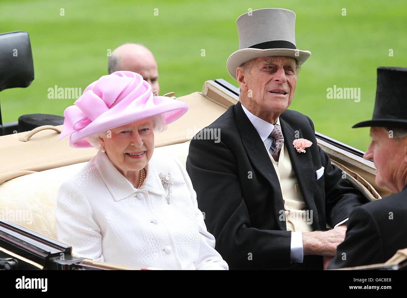 The royal procession as Queen Elizabeth II and the Duke Of Edinburgh ...