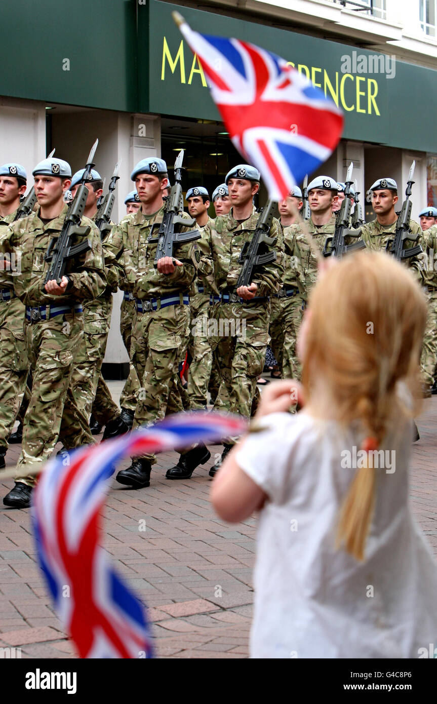 Child waves flag servicemen women regiment army air corps hi-res stock ...