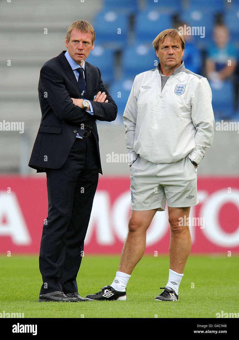 Englands under 21 manager stuart left his assistant steve wigley hi-res ...