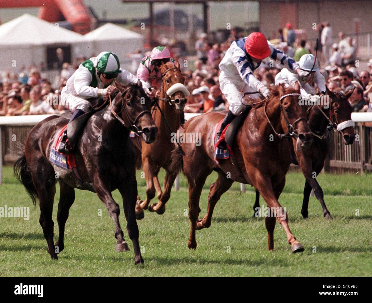 Magic Rainbow (left) with Richard Mullen up, winning the Coral Sprint ...