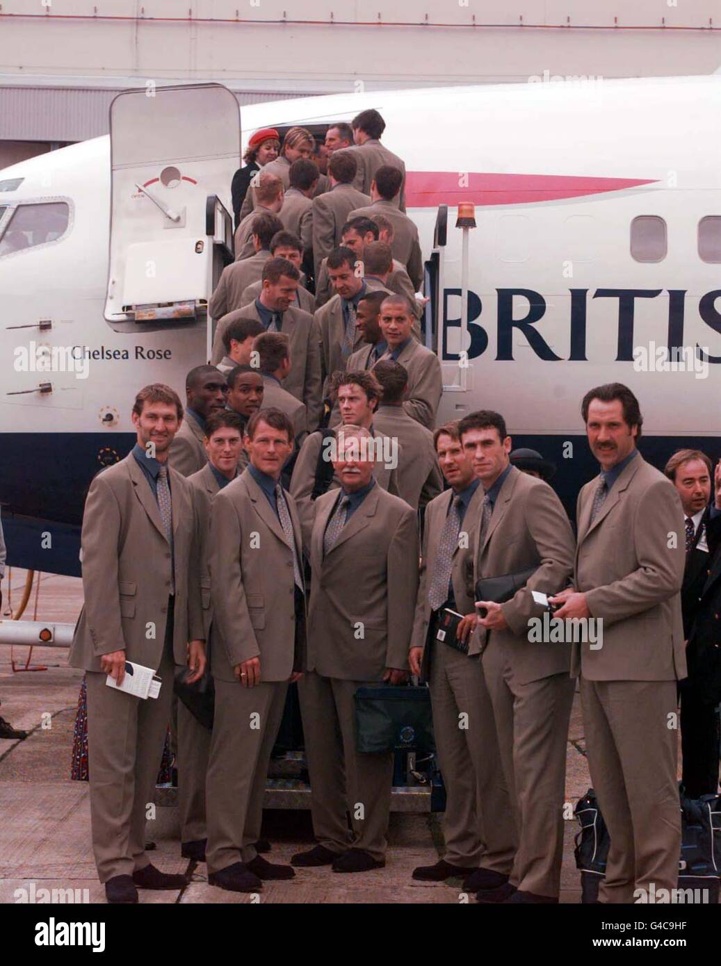 The England team board a plane at Heathrow Airport this morning ...