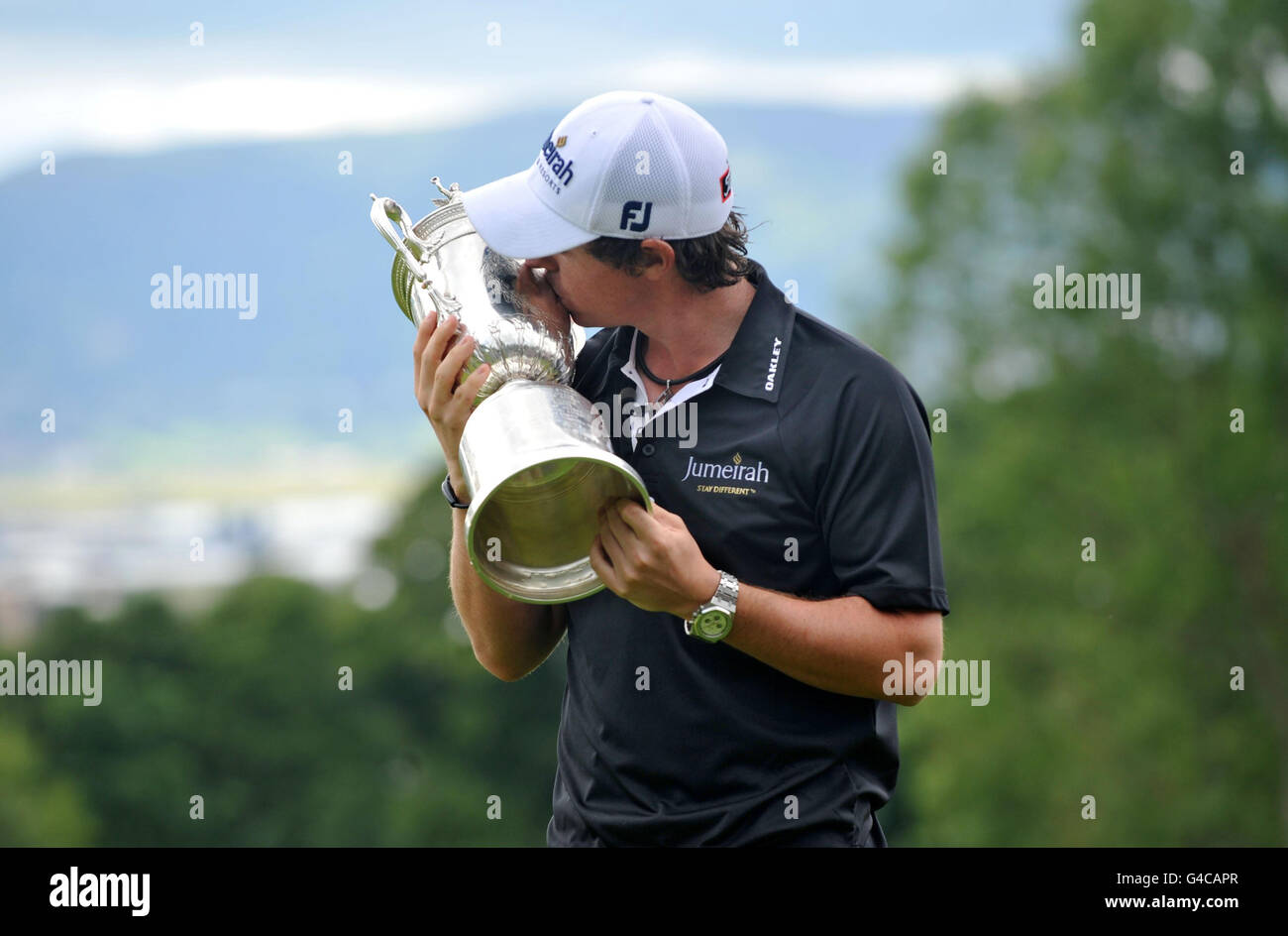 Newly crowned US Open Champion Rory McIlroy poses with the trophy ...