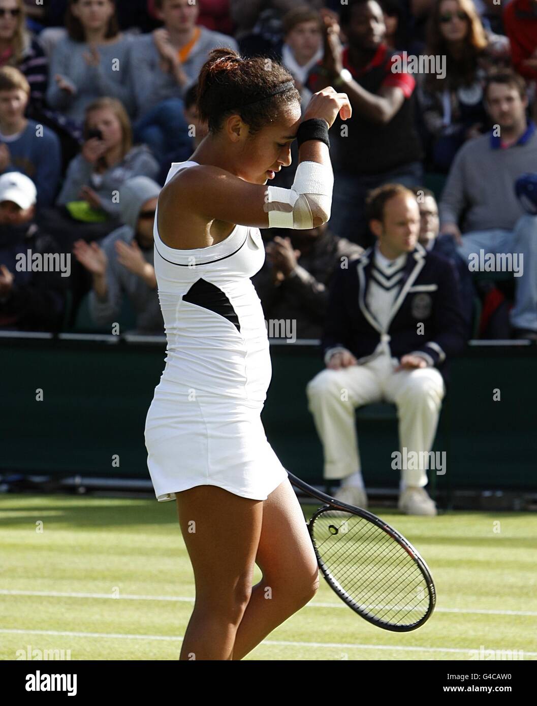 Great Britain's Heather Watson appears dejected after losing to France ...