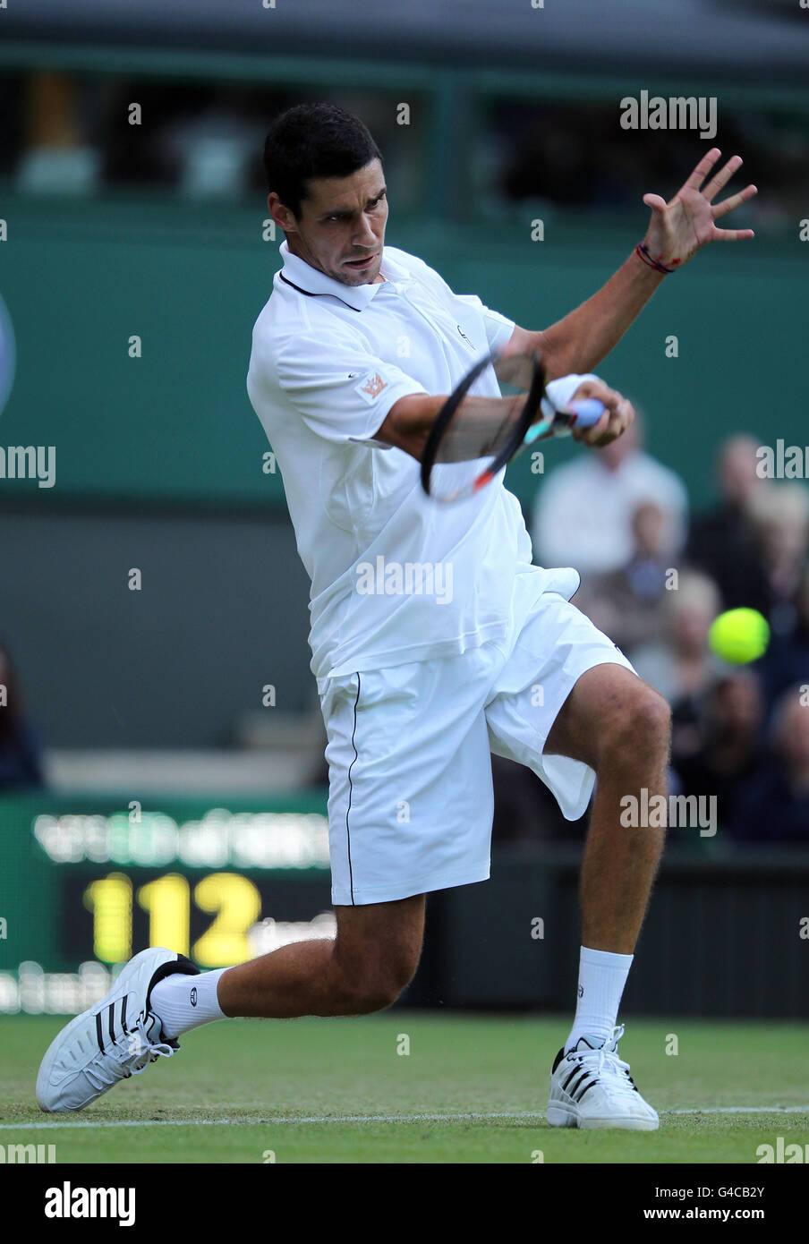 Romania's Victor Hanescu in action against USA's Andy Roddick during ...