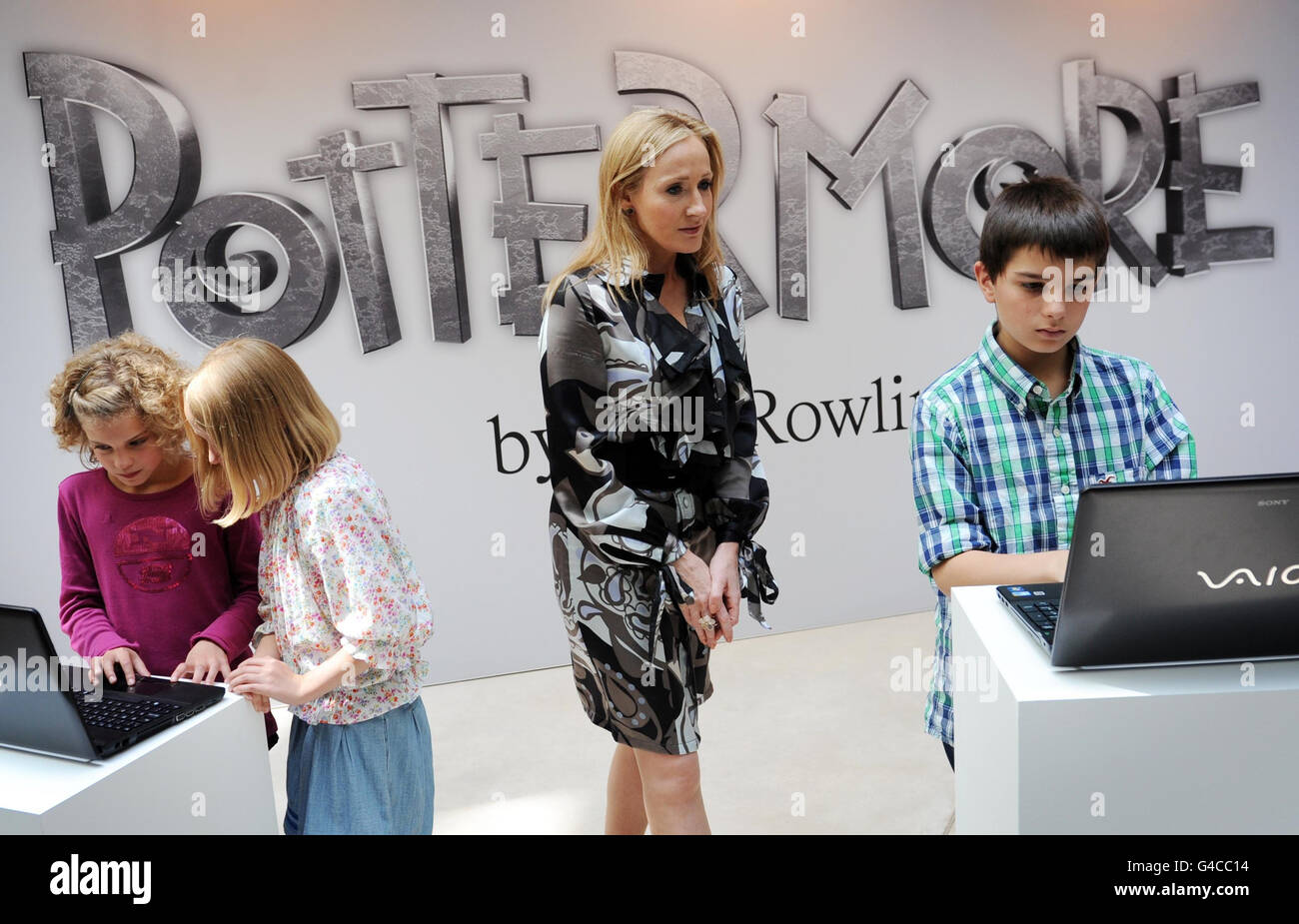 Harry Potter author JK Rowling watches young fans at the launch of her ...