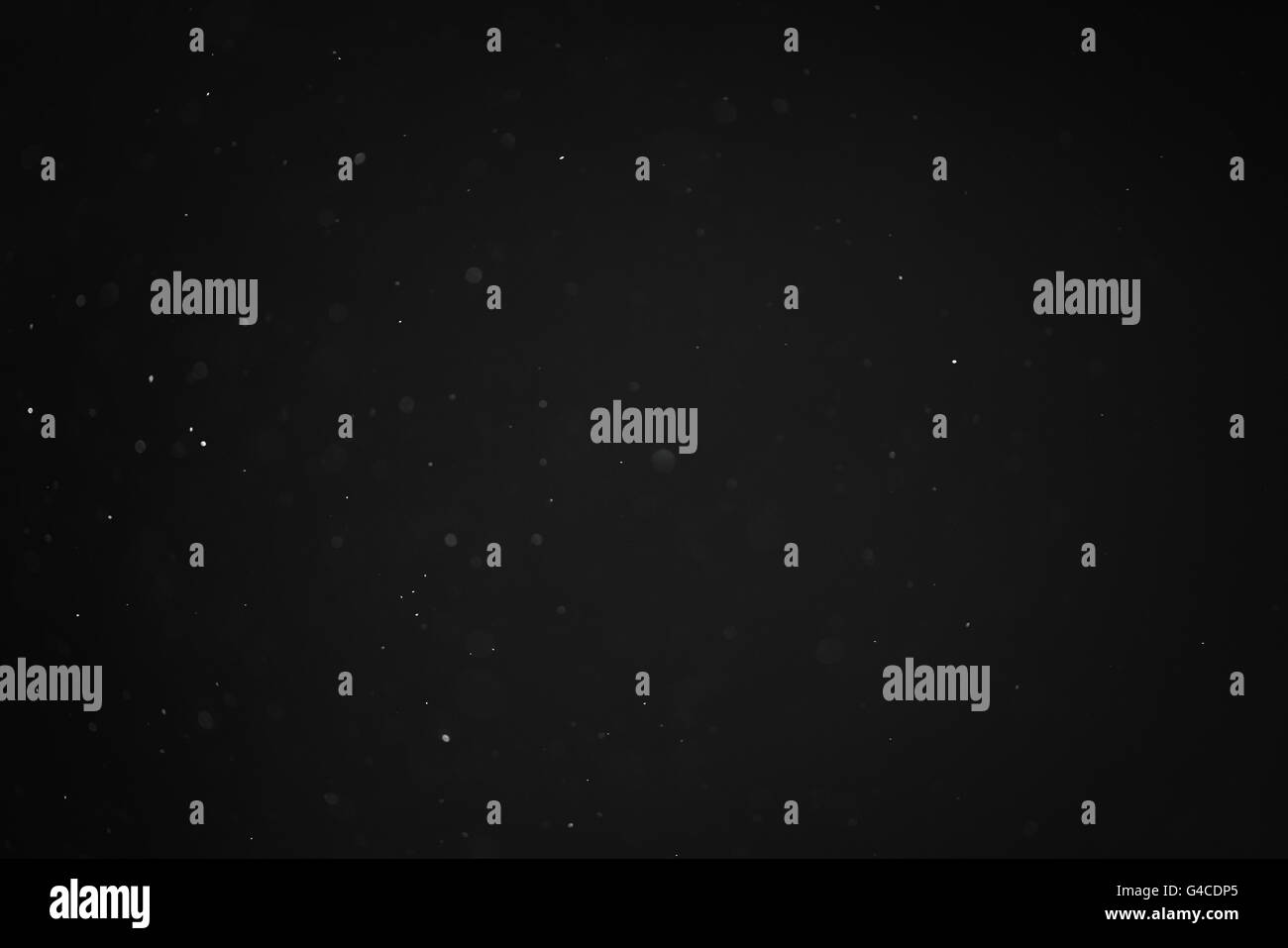 Abstract background flying light particles Black and White Stock Photos ...