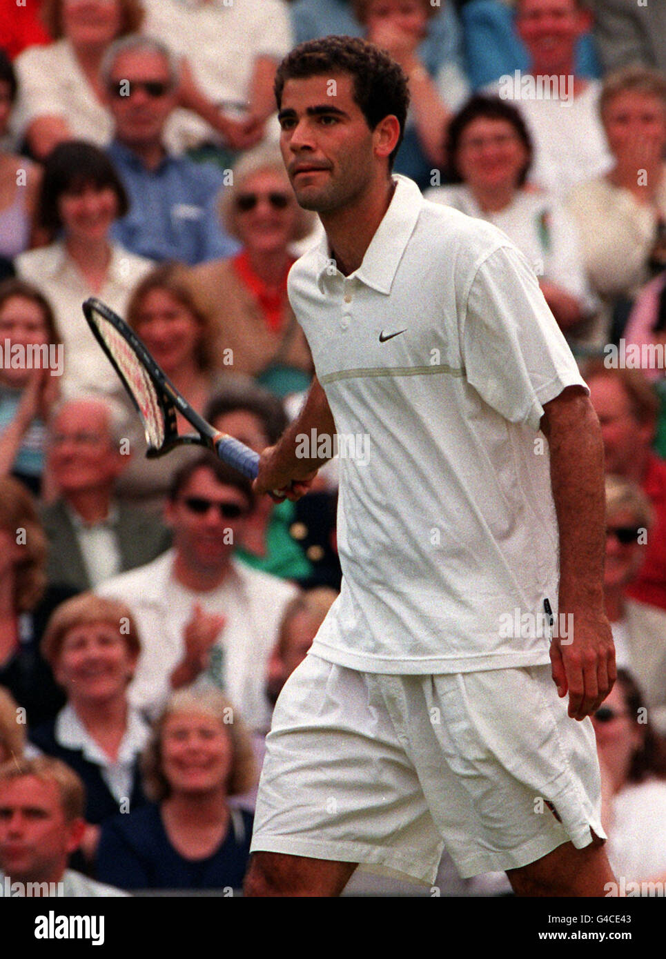 USA's Pete Sampras breaks a raquet prior to throwing it out into the ...