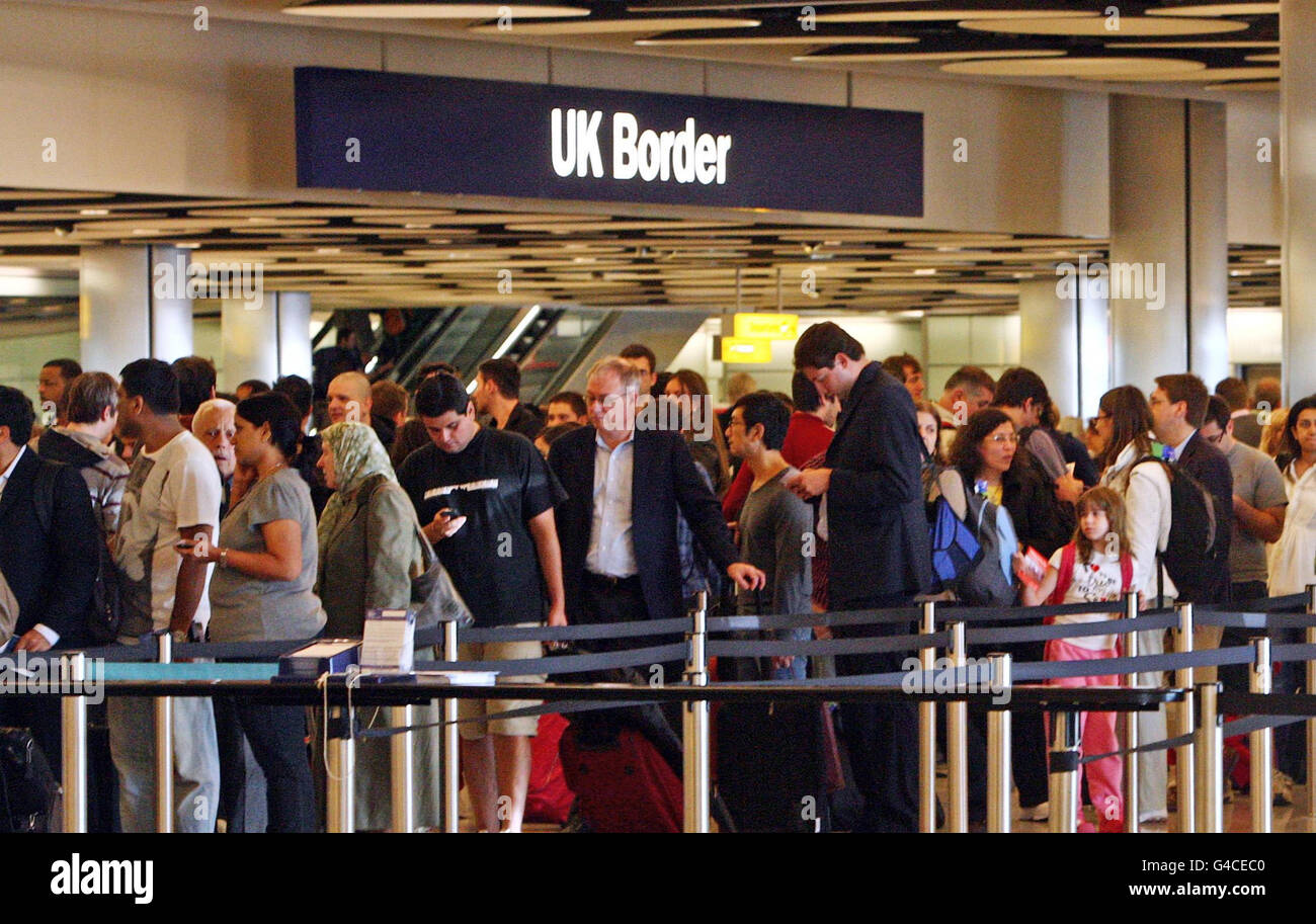 Queues at Border Control in Terminal Five of London's Heathrow Airport ...