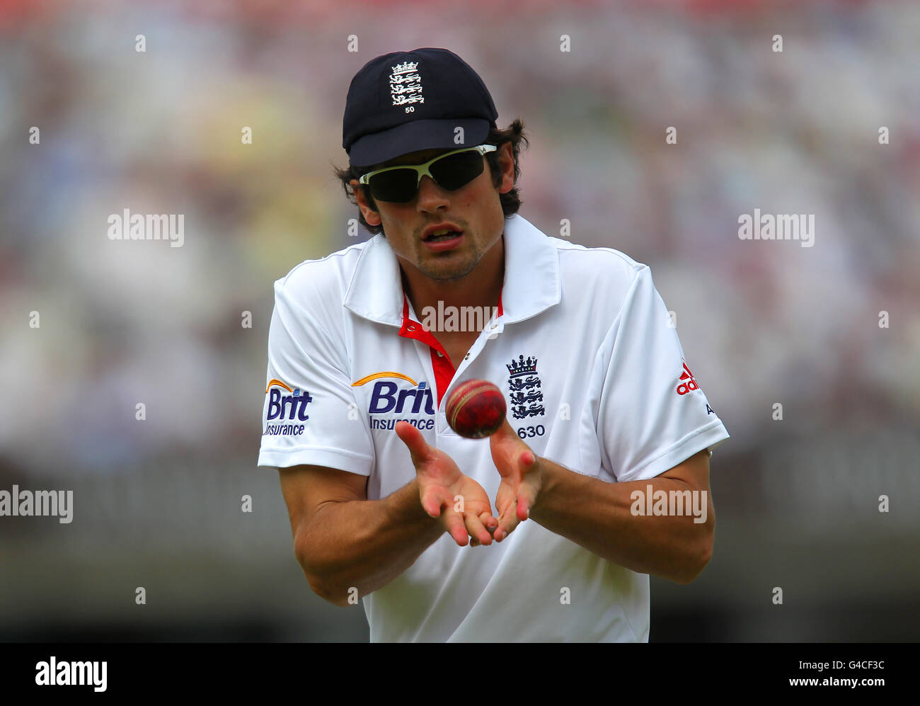 Englands alistair cook in action fielding hi-res stock photography and ...