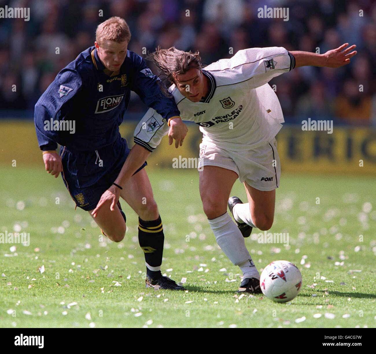 Wimbledon's Ben Thatcher (left) and Tottenham Hotspur's David Ginola ...