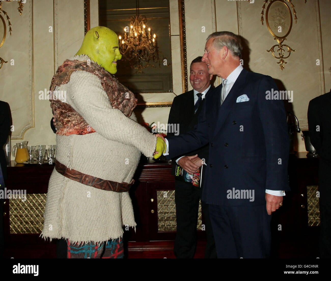 The Prince of Wales meets Nigel Lindsay as Shrek before a special ...