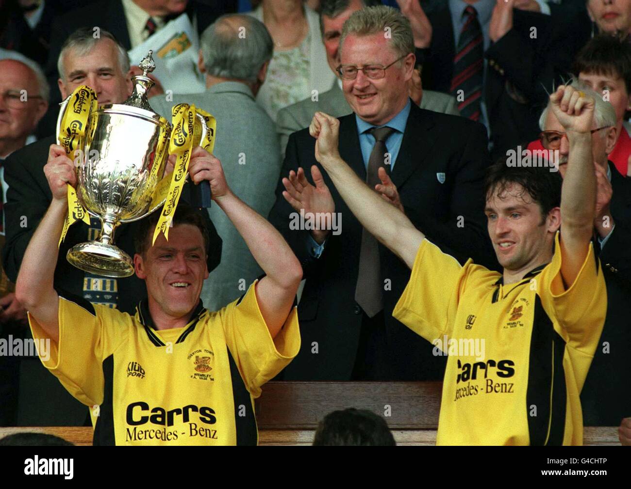 Tiverton Town Capt. Kevin Smith (left) celebrates winning the FA Vase ...