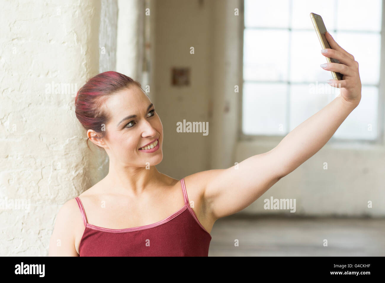 Woman taking a selfie with mobile phone Stock Photo - Alamy