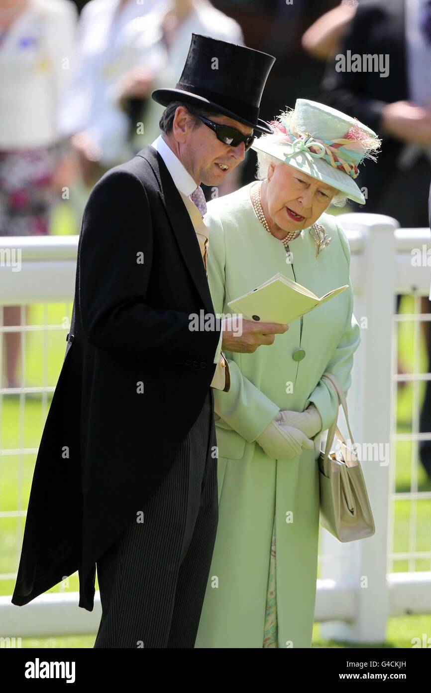Queen Elizabeth II checks the form during Day One of the 2011 Royal ...