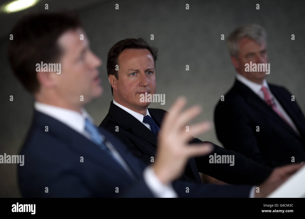 Prime Minister David Cameron and Health Secretary Andrew Lansley look ...