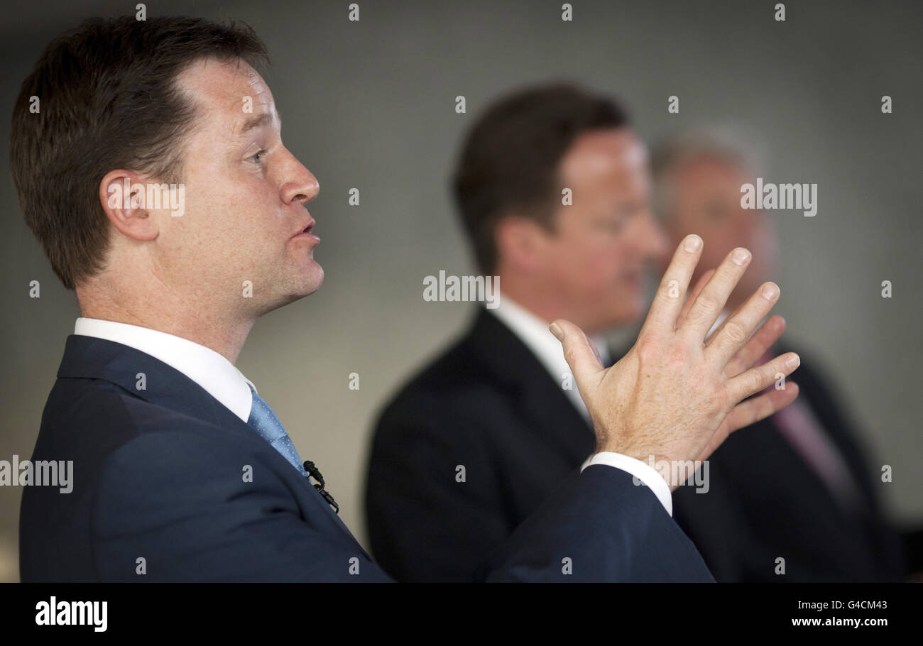 Prime Minister David Cameron and Health Secretary Andrew Lansley look ...