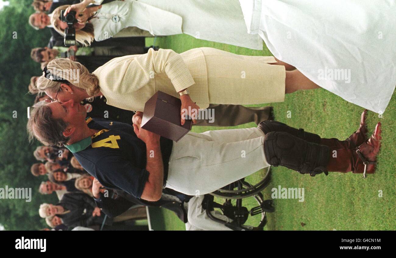 The prince wales kisses bridget hanbury receives award hi-res stock ...