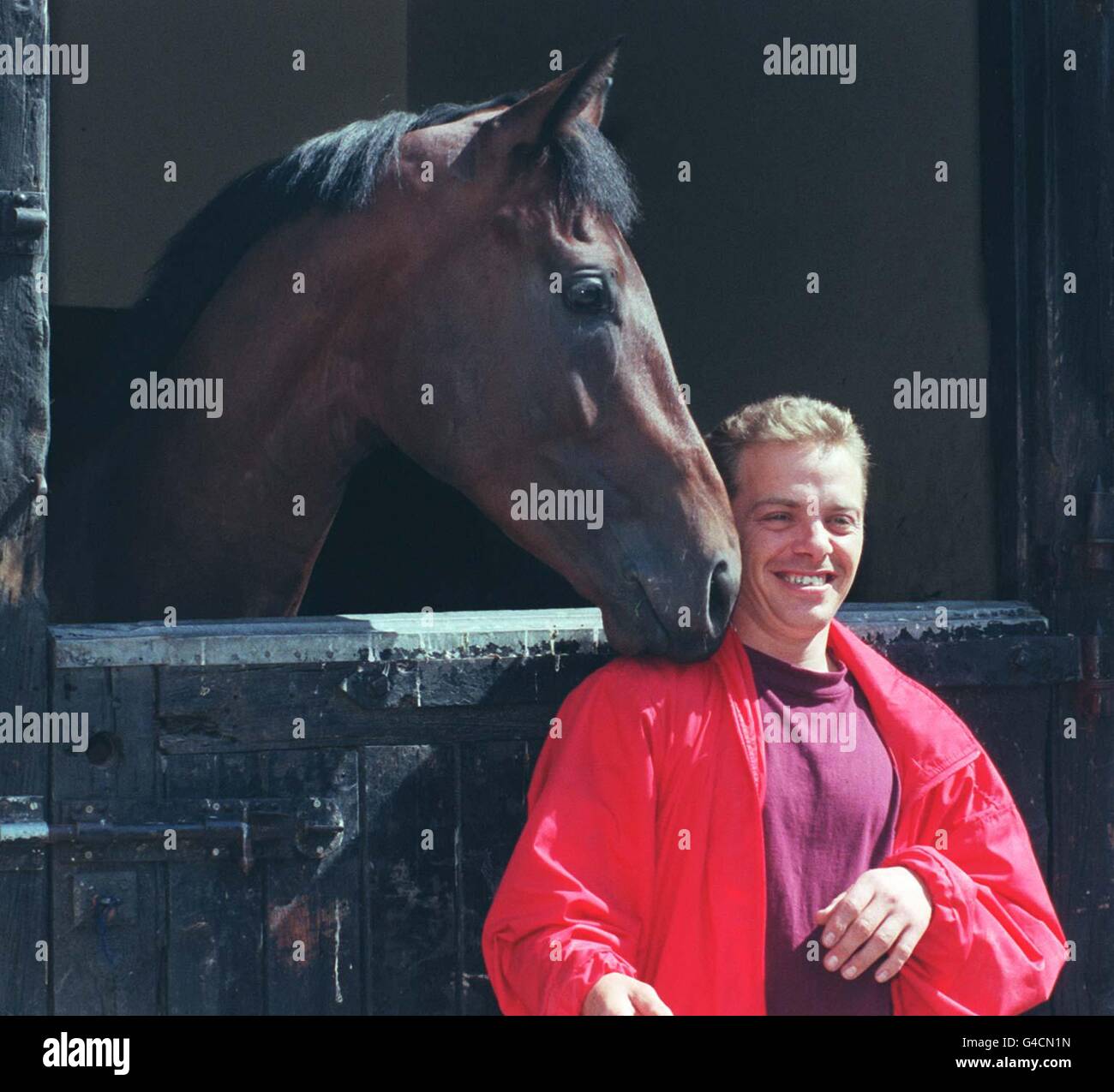 Stable lad Ian Glindoni with High Rise yesterday's Derby Winner at the ...