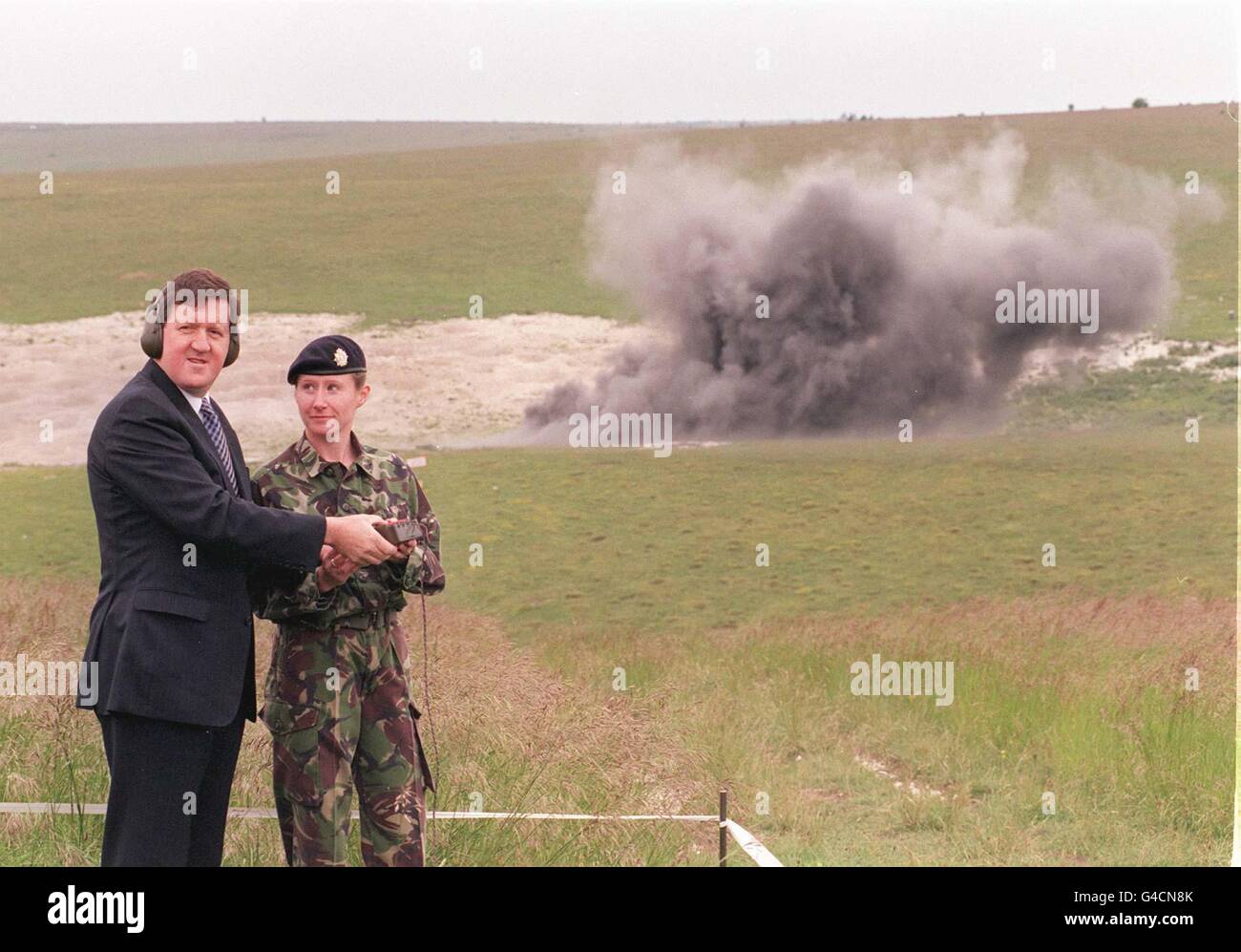 Defence Secretary George Robertson, with L/Cpl Nikki Nunn, of the Royal ...