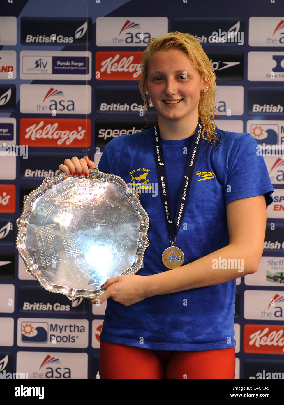 City of Leeds' Anne Bochmann celebrates with her gold medal and trophy ...