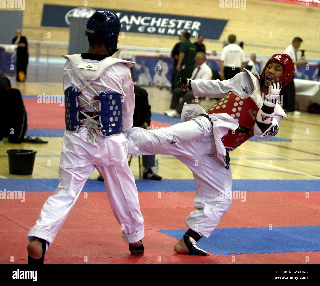 Great Britain's Jordan Gayle (red) and England's Mohammad Masood Aslami ...