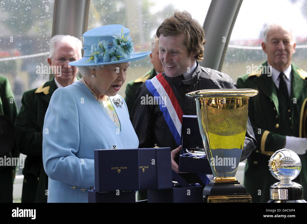 Queen elizabeth ii presents trophy winning jockey society rock hi-res ...