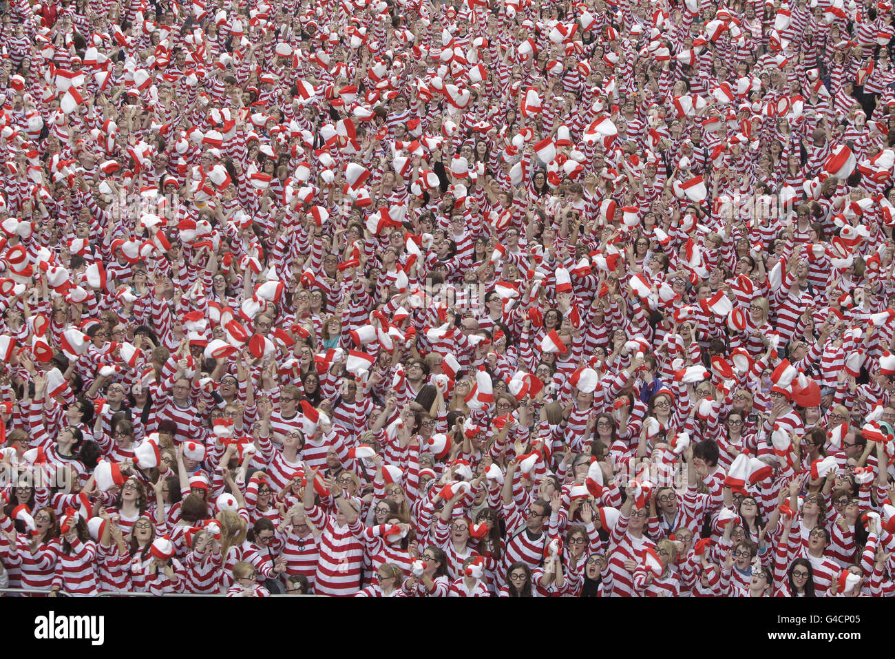 People dressed as the cartoon character Where's Wally celebrate in ...