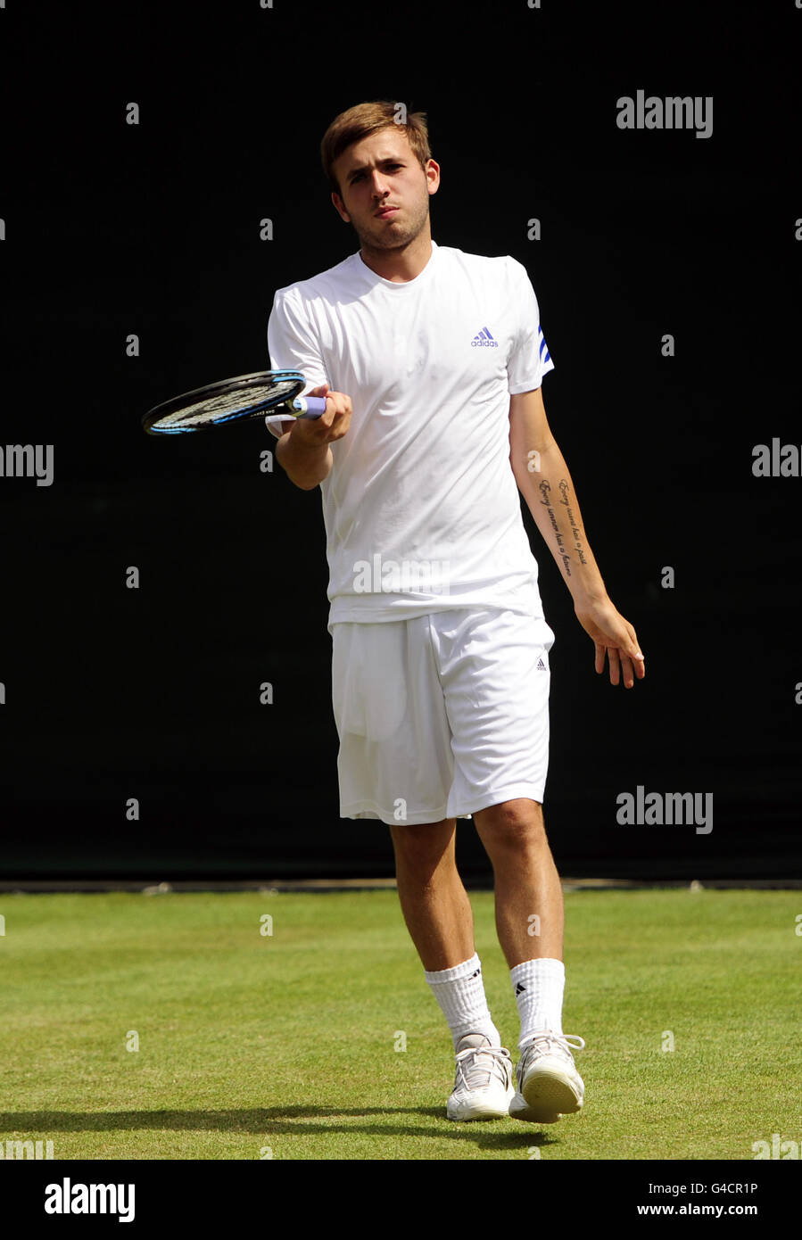 Great Britain's Daniel Evans in action against Germany's Florian Mayer ...