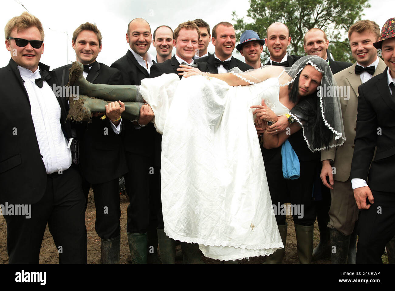 A stag-do party, with groom Will Prosser, 30, from Bristol dressed as ...