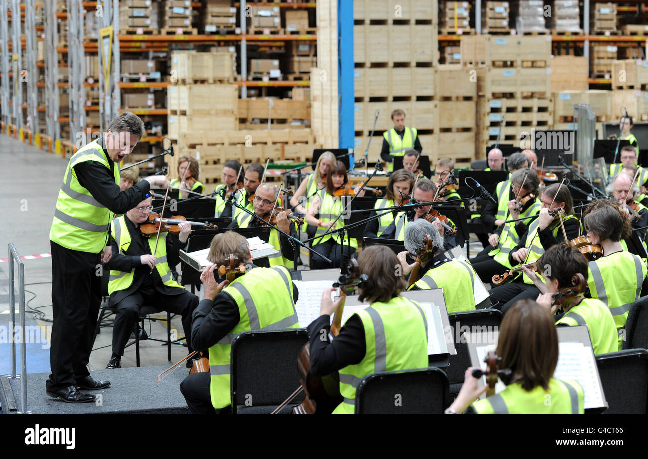 Steve Bell conducts 90 musicians from the BBC Philharmonic as they ...