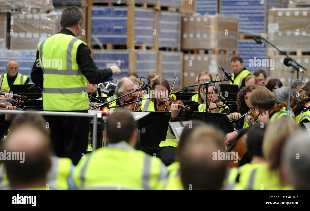 Steve Bell conducts 90 musicians from the BBC Philharmonic as they ...