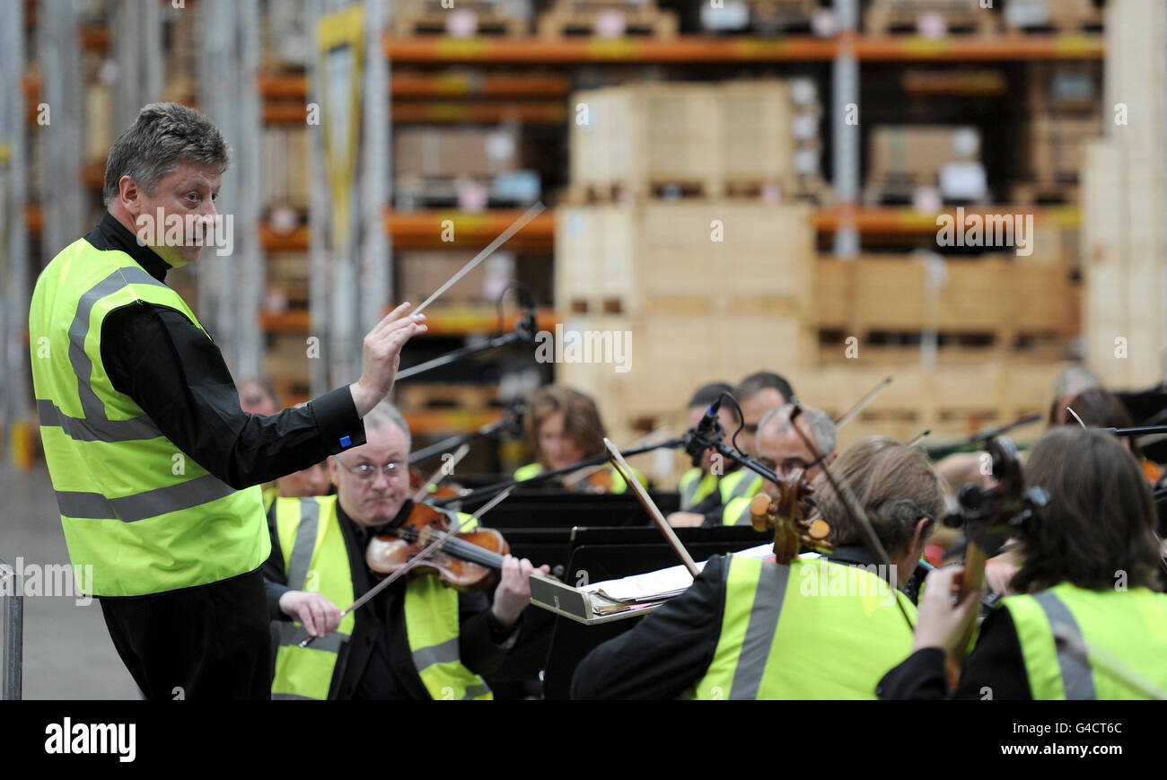 Steve Bell conducts 90 musicians from the BBC Philharmonic as they ...