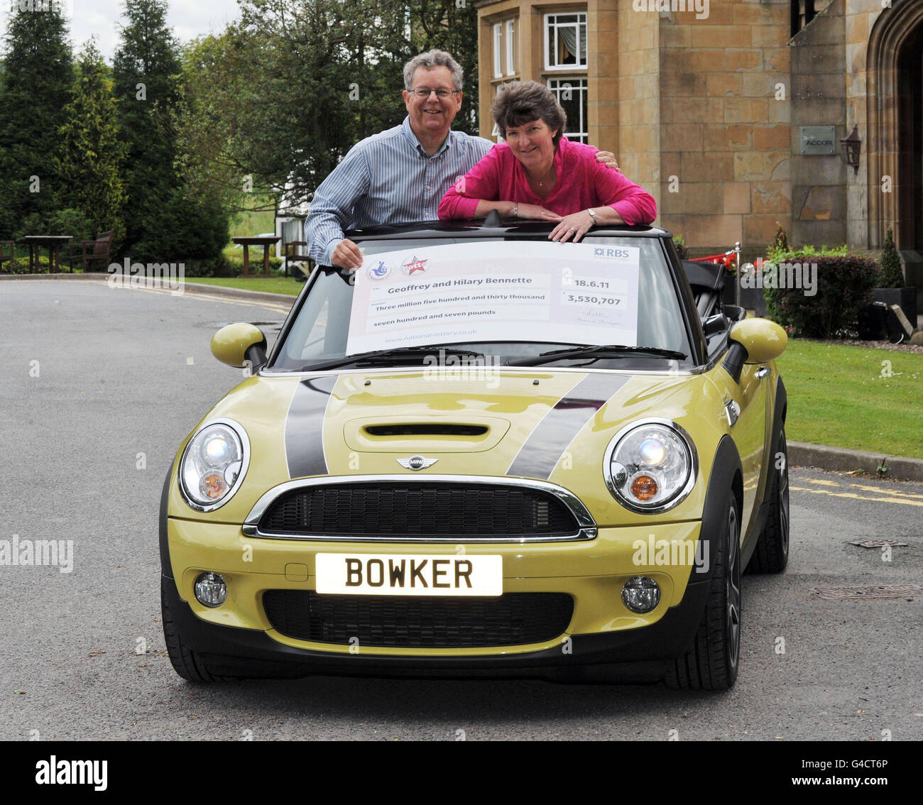 Geoffrey and Hilary Bennette, from Blackburn, celebrate after winning a ...