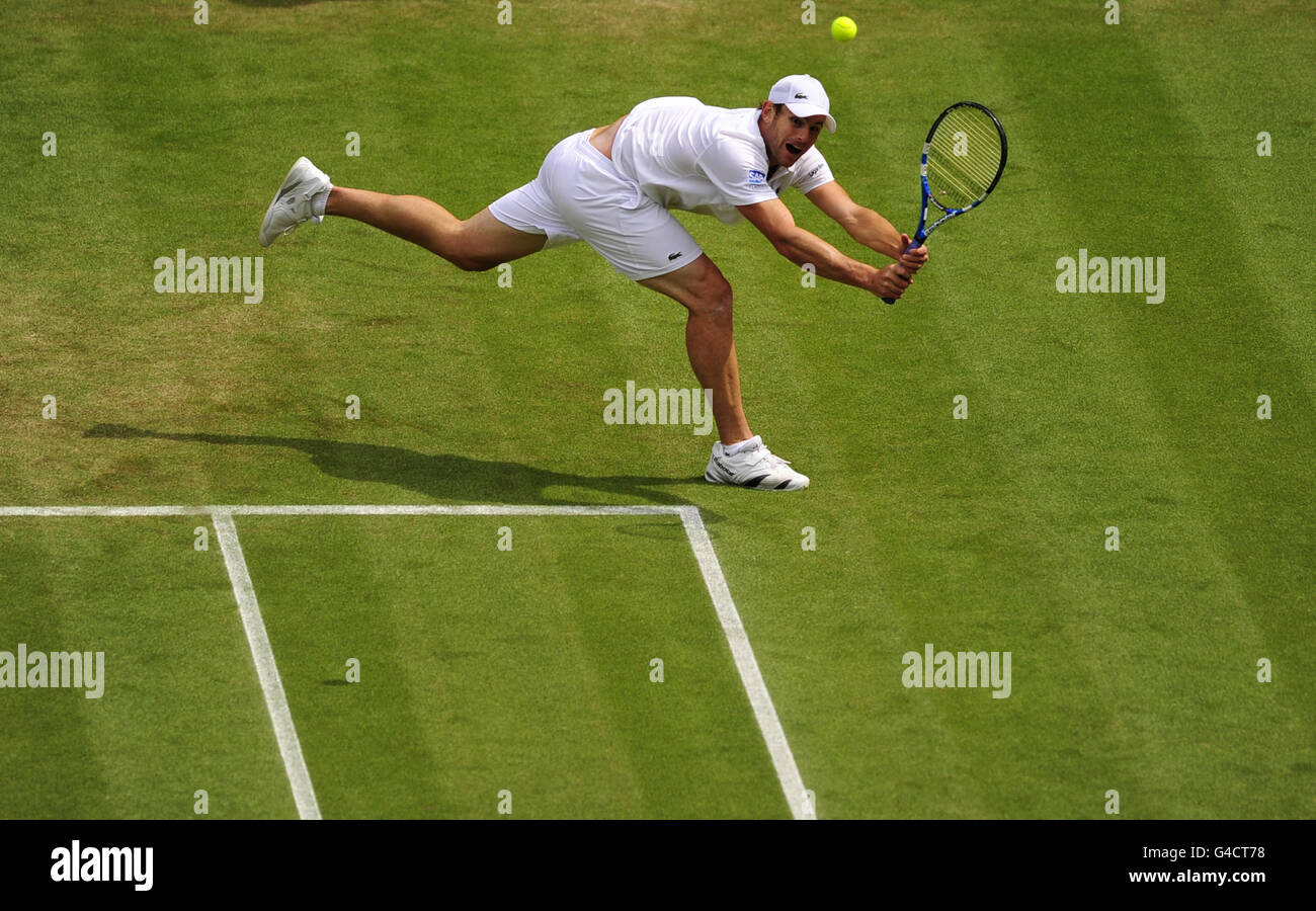USA's Andy Roddick stretches for the ball during his match against ...