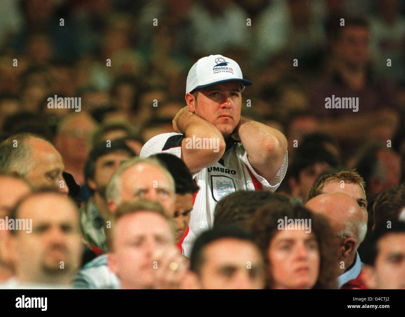 England fans dejected after their 2-1 defeat at the hands of Romania in ...