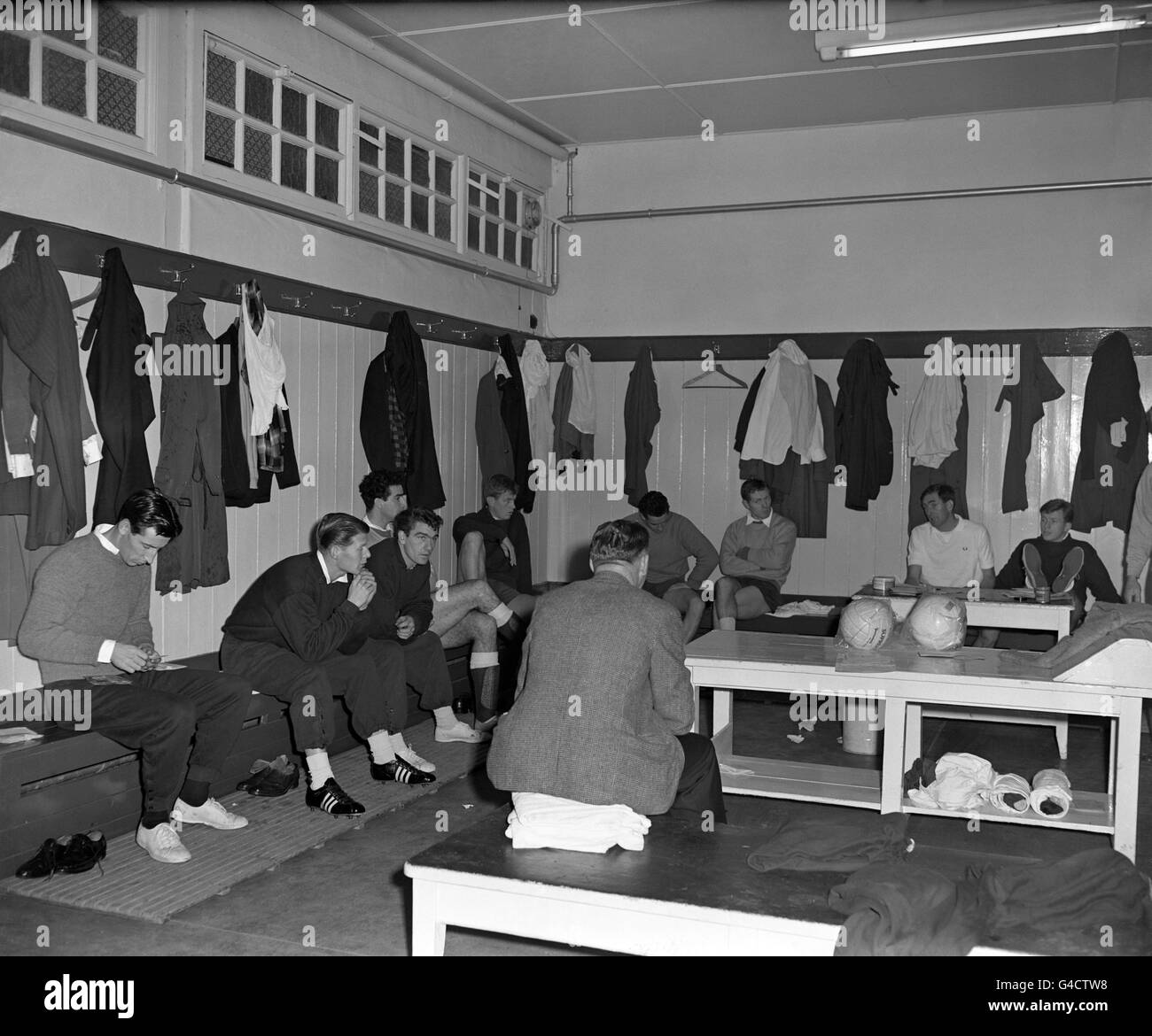 Manager Bill Nicholson (back to camera) talking with the players in the ...