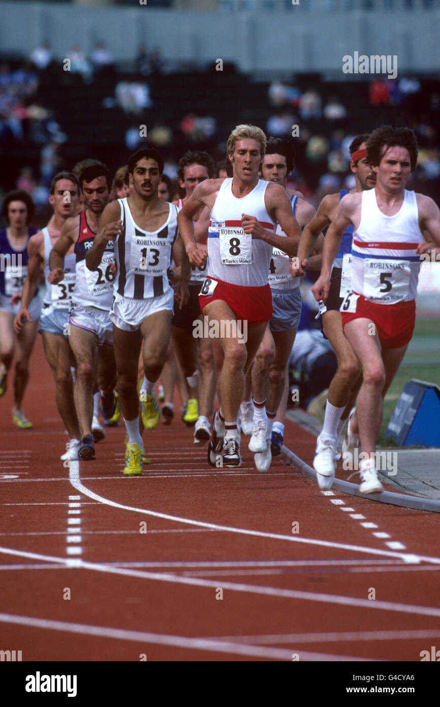 Steve Binns (5) leads from David Clarke (8) in the Men's 10000 metres ...